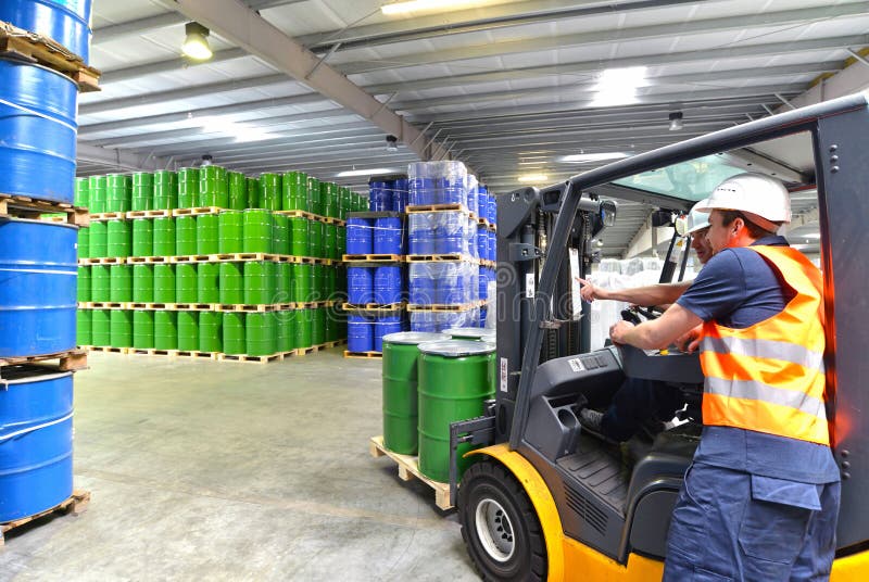 Group of Workers in the Logistics Industry Work in a Warehouse W Stock ...