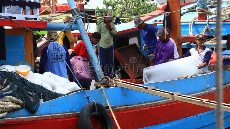 A Group of Workers when Moving Blocks of Ice Editorial Stock Photo ...