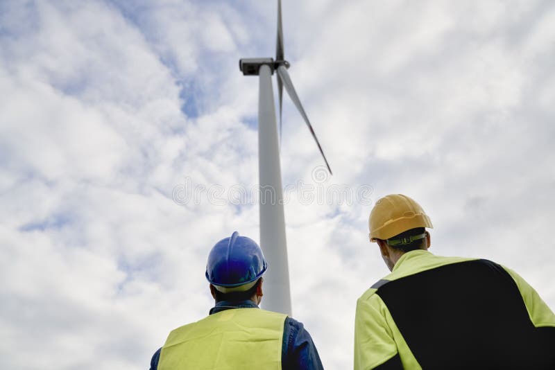 Group of Workers Standing on Wind Turbine Field Stock Image - Image of ...