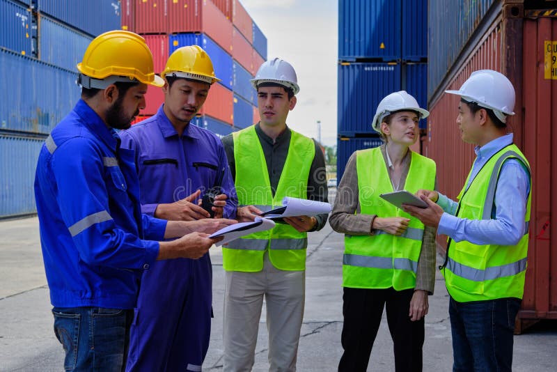 Group of Workers Teamwork at Logistics Terminal with Many Stacks of ...