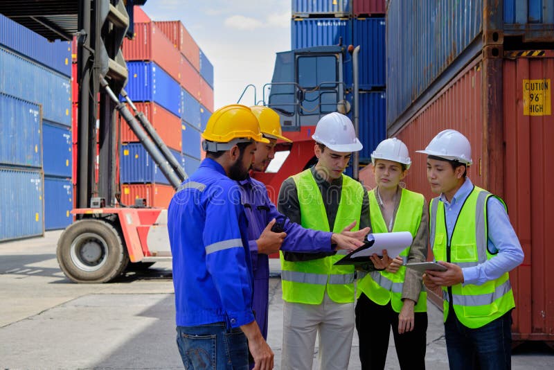 Group of Workers Teamwork at Logistics Terminal with Many Stacks of ...