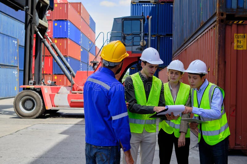 Group of Workers Teamwork at Logistics Terminal with Many Stacks of ...