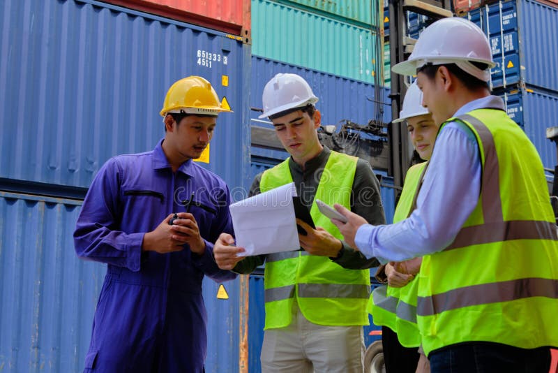 Group of Workers Teamwork at Logistics Terminal with Many Stacks of ...