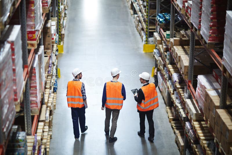 Group of Workers in Warehouse Stock Photo - Image of warehouse ...