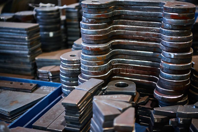 Group of Workpieces Cut of Metal Sheet in Storehouse Stock Photo ...
