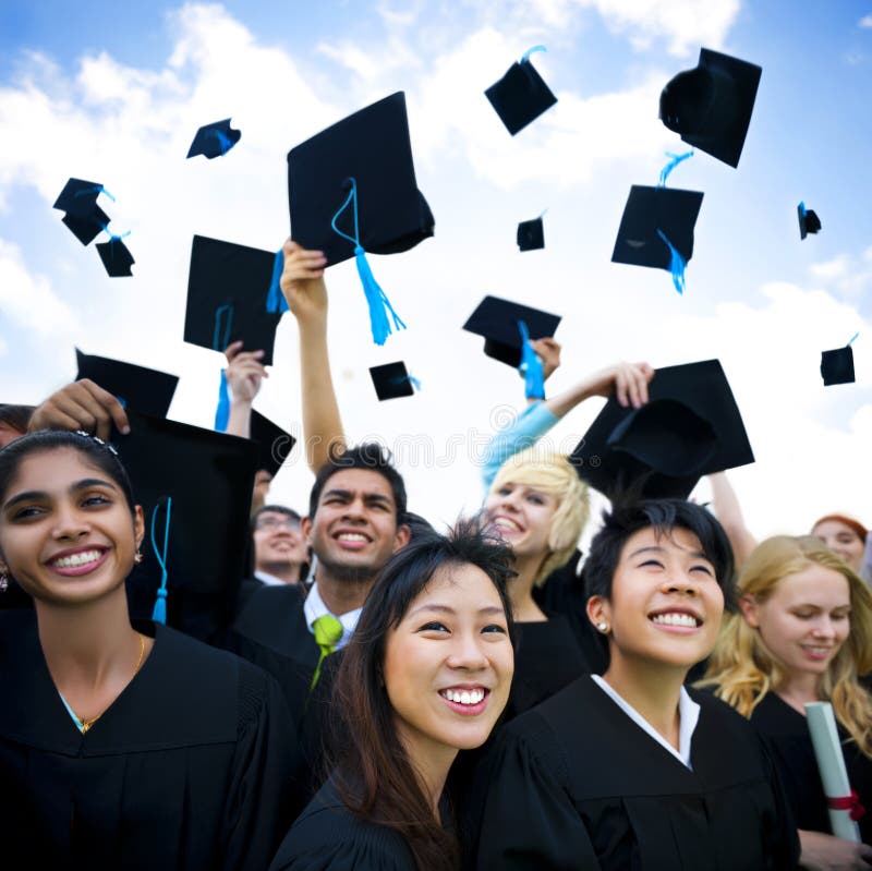 Students in Graduation Gowns Holding Diplomas on Stock Photo - Image of ...