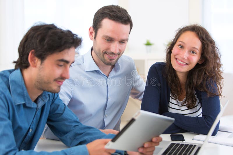 Group of Young Active People Working Together Stock Image - Image of ...