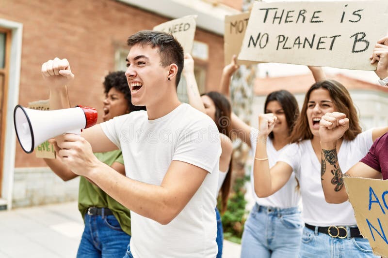 Group of Young Activists People Protesting Holding Banner and Using ...