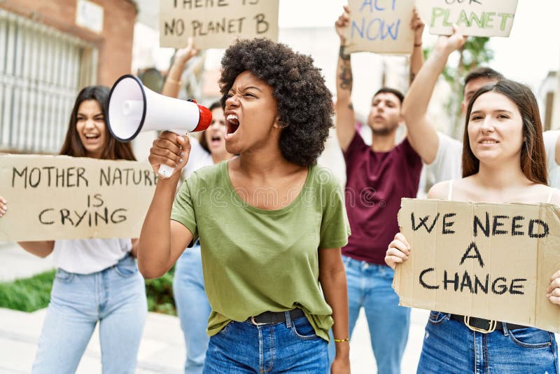 Group of Young Activists People Protesting Holding Banner and Using ...