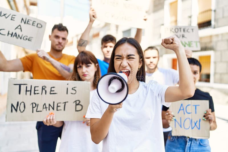 Group of Young Activists Protesting Holding Banner and Using Megaphone ...