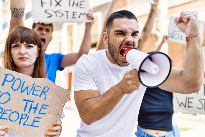 Group of Young Activists Protesting Holding Banner and Using Megaphone ...