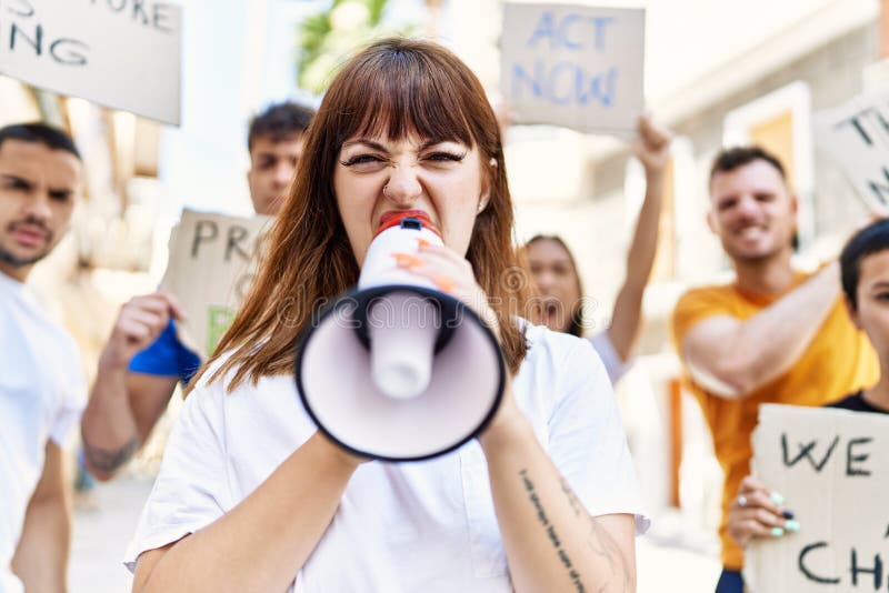 Group of Young Activists Protesting Holding Banner and Using Megaphone ...