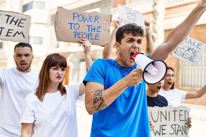 Group of Young Activists Protesting Holding Banner and Using Megaphone ...