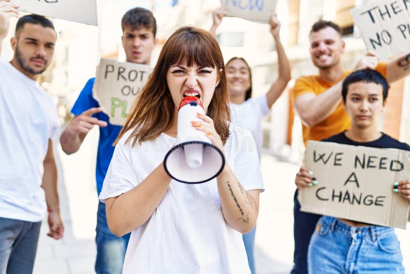 Group of Young Activists Protesting Holding Banner and Using Megaphone ...