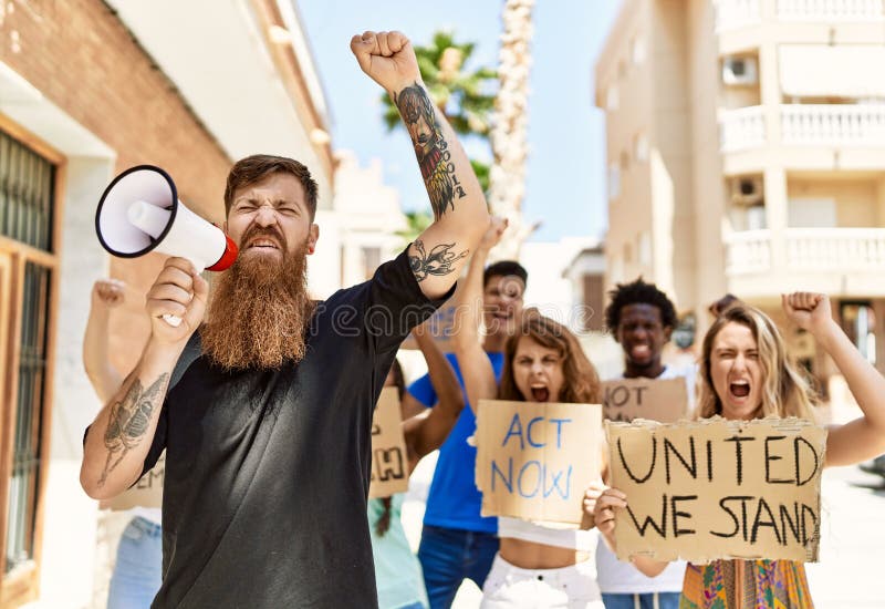 Group of Young Activists Protesting Holding Banner and Using Megaphone ...