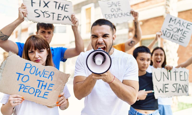 Group of Young Activists Protesting Holding Banner and Using Megaphone ...