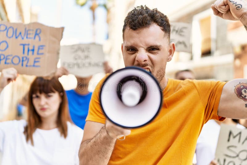 Group of Young Activists Protesting Holding Banner and Using Megaphone ...