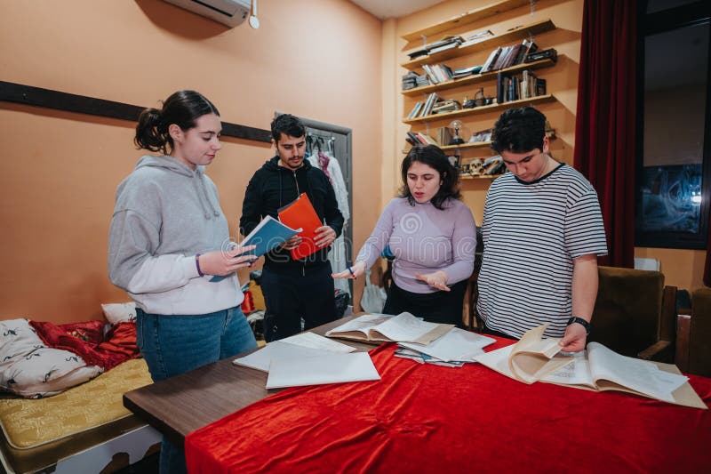 Group of Young Actors Rehearsing with Scripts Backstage in a Cozy ...
