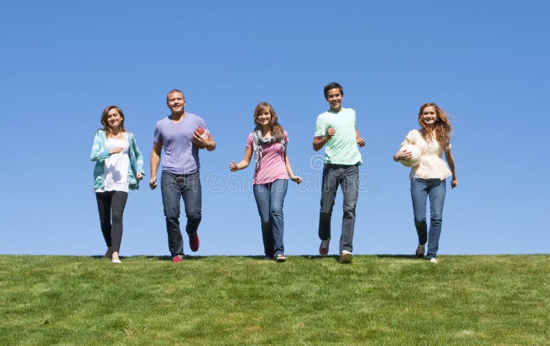 Group Of Young Adults Playing Outdoors Stock Image - Image: 14930061