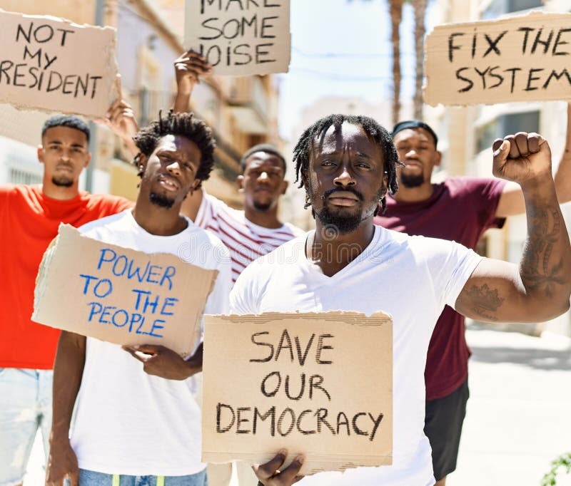 Group of Young African American Activists Holding Protest Banner ...