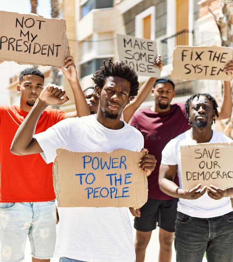 Group of Young African American Activists Holding Protest Banner ...