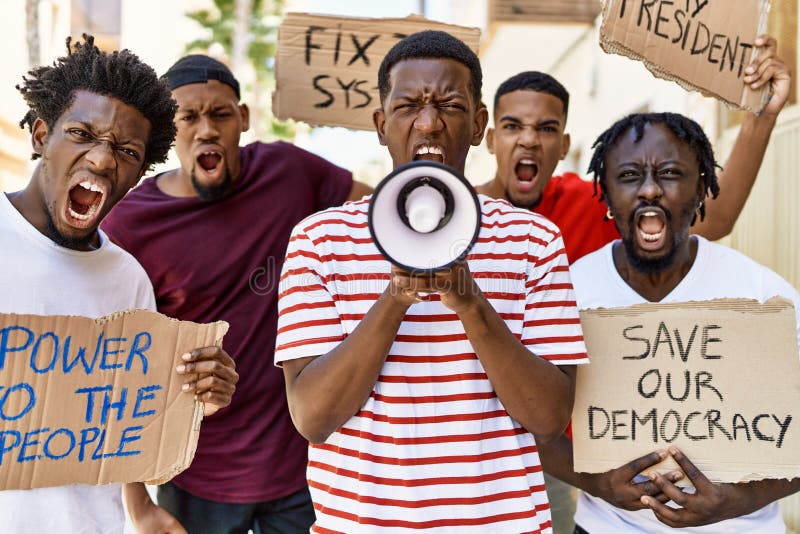 Group of Young African American Activists Protesting Holding Banner and ...