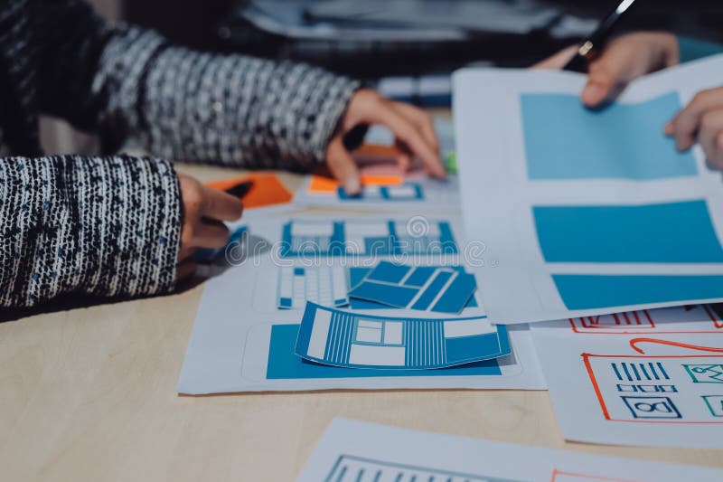 Group of Young Application Developers Analyzing Uxui Mobile App ...