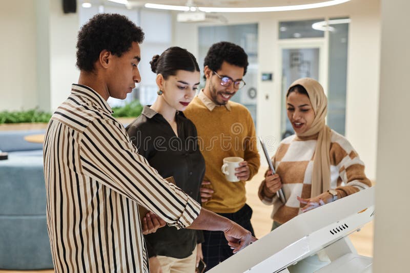 Group of Young Arabian Business Professionals Using Digital Screen in ...