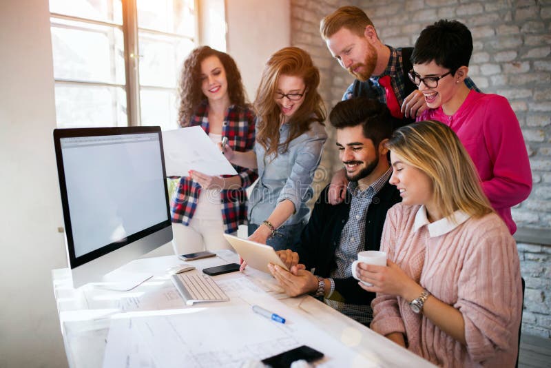 Group of Young Architects Using Digital Tablet Stock Image - Image of ...