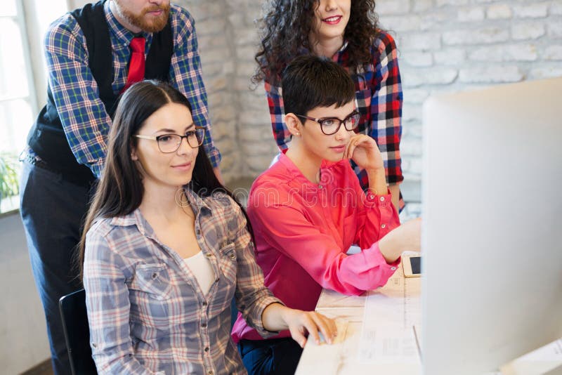 Group of Young Architects Working on Computer Stock Photo - Image of ...
