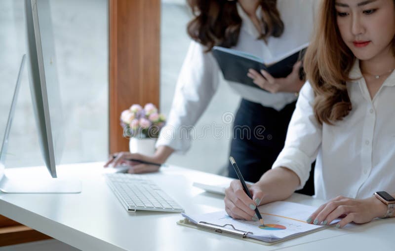 Group of Young Asian Business People Brainstorm Collaboration Ideas at ...