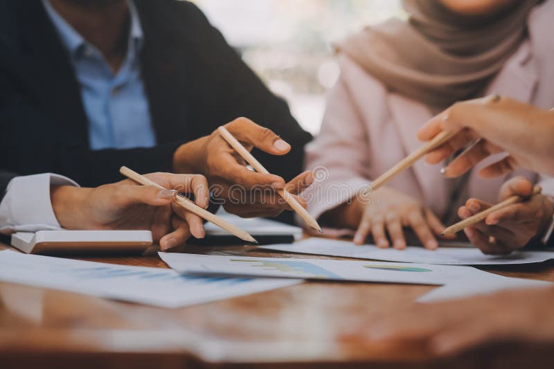 Group of Young Asian Business People Brainstorm Collaboration Ideas at ...