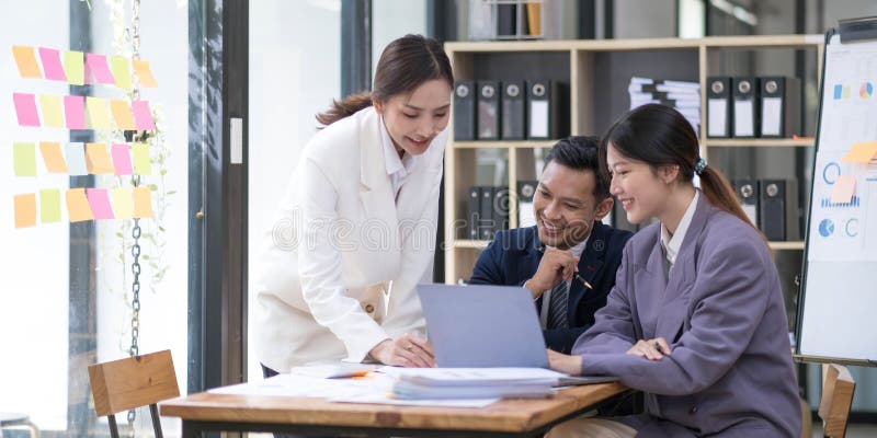 Group of Young Asian Modern People in Smart Casual Wear Having a ... Group of Young Asian Modern People in Smart Casual Wear Having a ...