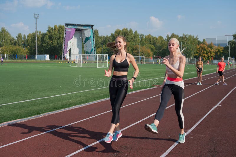 Group of Young Athletes Training at the Stadium Stock Image - Image of ...