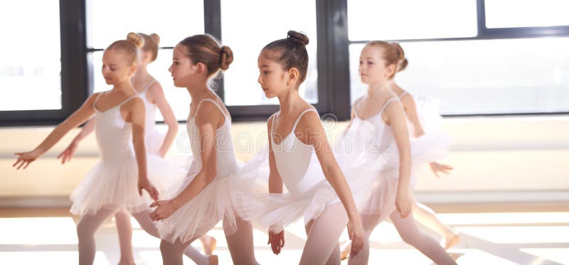 Group of Young Ballerinas Performing Stock Photo - Image of interest, classical: 54321052