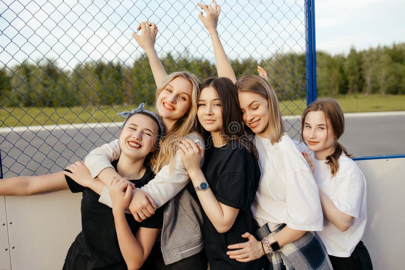Group Of Young Beautiful Girlfriends Smiling Standing Together