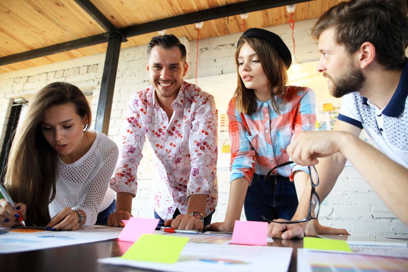 Group of Young Business People and Designers.they Working on New ...