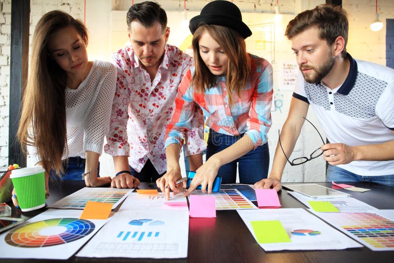 Group of Young Business People and Designers.they Working on New ...
