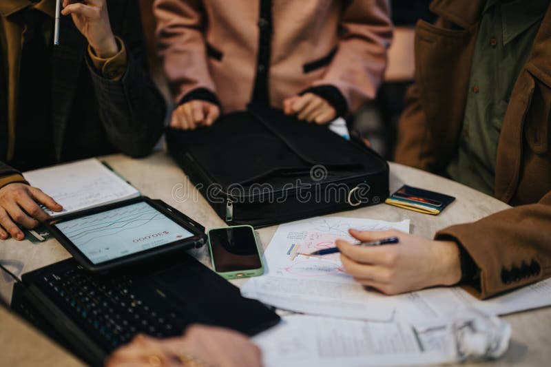 Young Business Professionals Collaborating on a Project Outside Stock ...