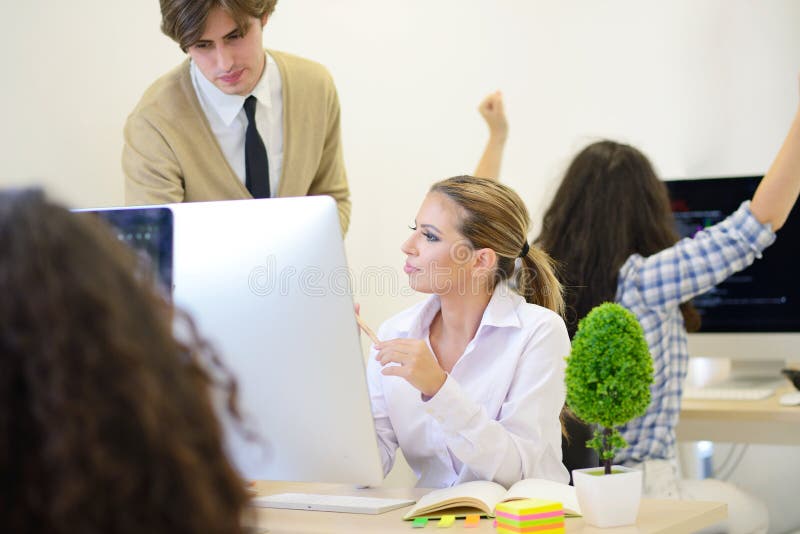 Group of Young Business People Having Fun, Relaxing and Working in ...