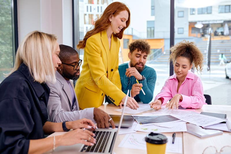 Group of Young Business People Having Meeting in Office, Having Talk ...