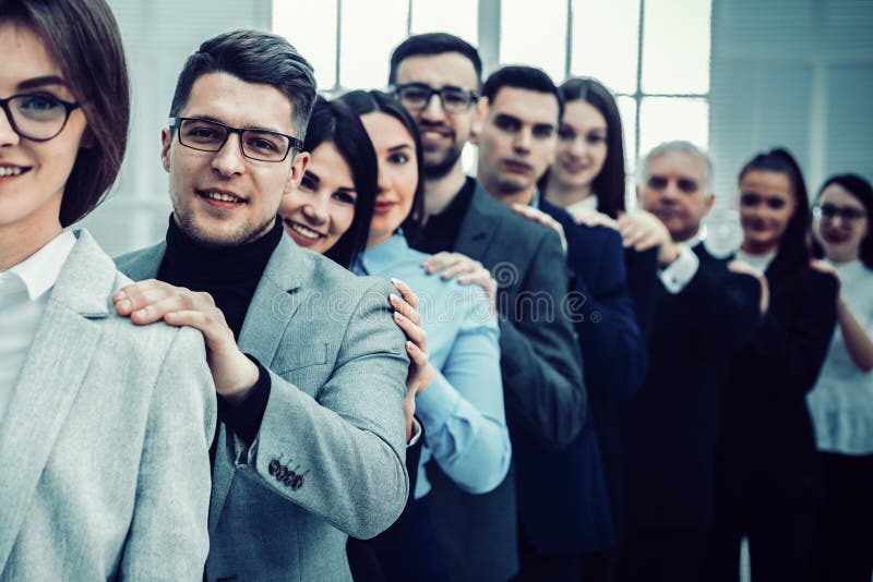 Group of Young Business People Standing Behind Each Other Stock Photo ...