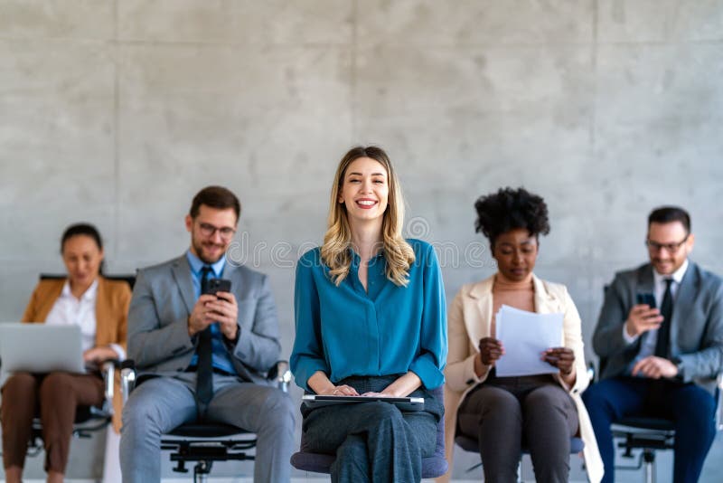 Group of Young Business People Working As a Team and Communicating in ...
