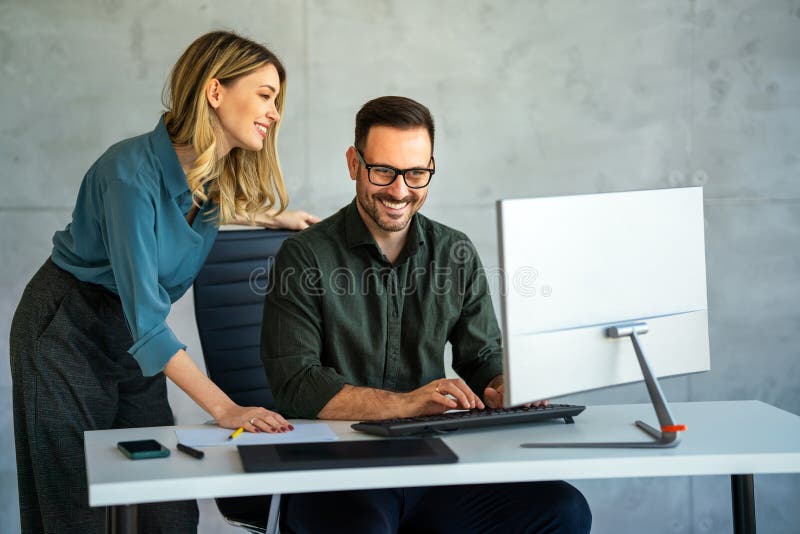 Group of Young Business People Working As a Team and Communicating in ...