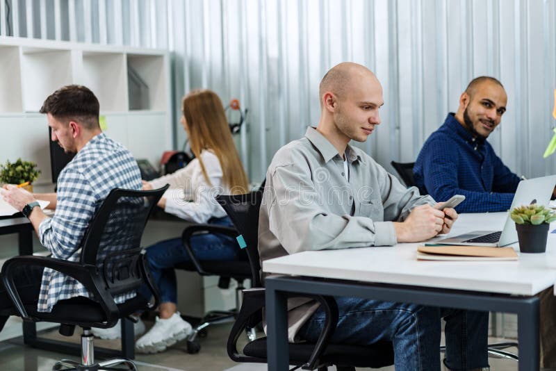 Group of Young Business People Working in Office Together Stock Image ...