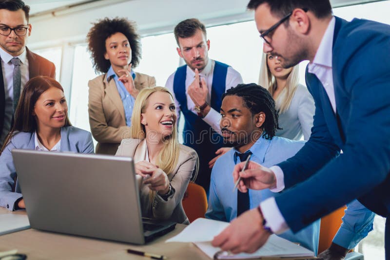 Young Business People Working Together in Creative Office. Selective ...