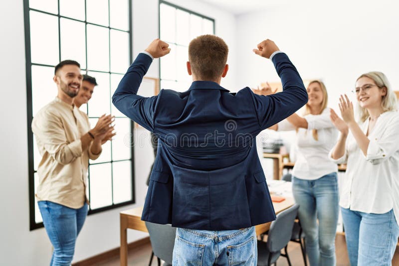 Group of Young Business Workers Smiling and Clapping Stock Image ...