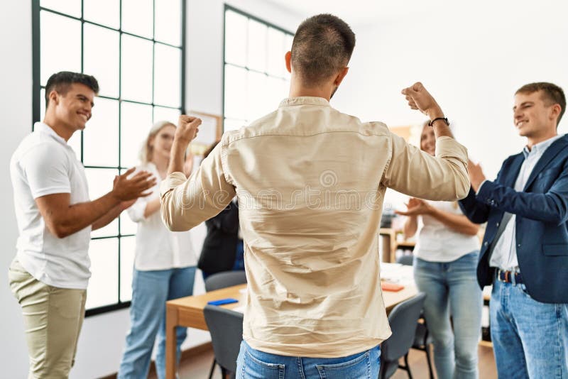 Group of Young Business Workers Smiling and Clapping Stock Image ...