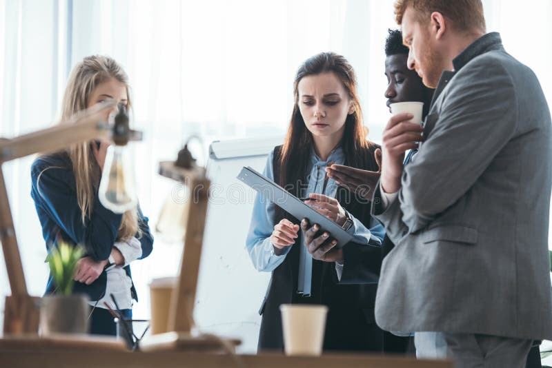 Group of Young Businesspeople Discovering Stock Photo - Image of ...