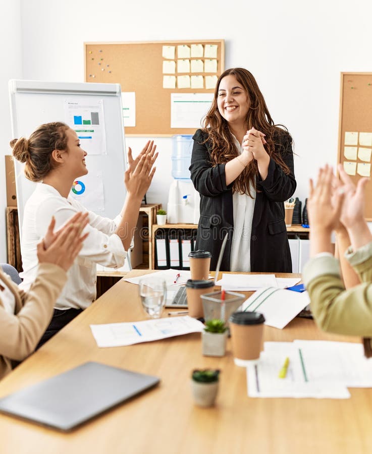 Group of Young Businesswomen Smiling and Clapping To Partner at the ...